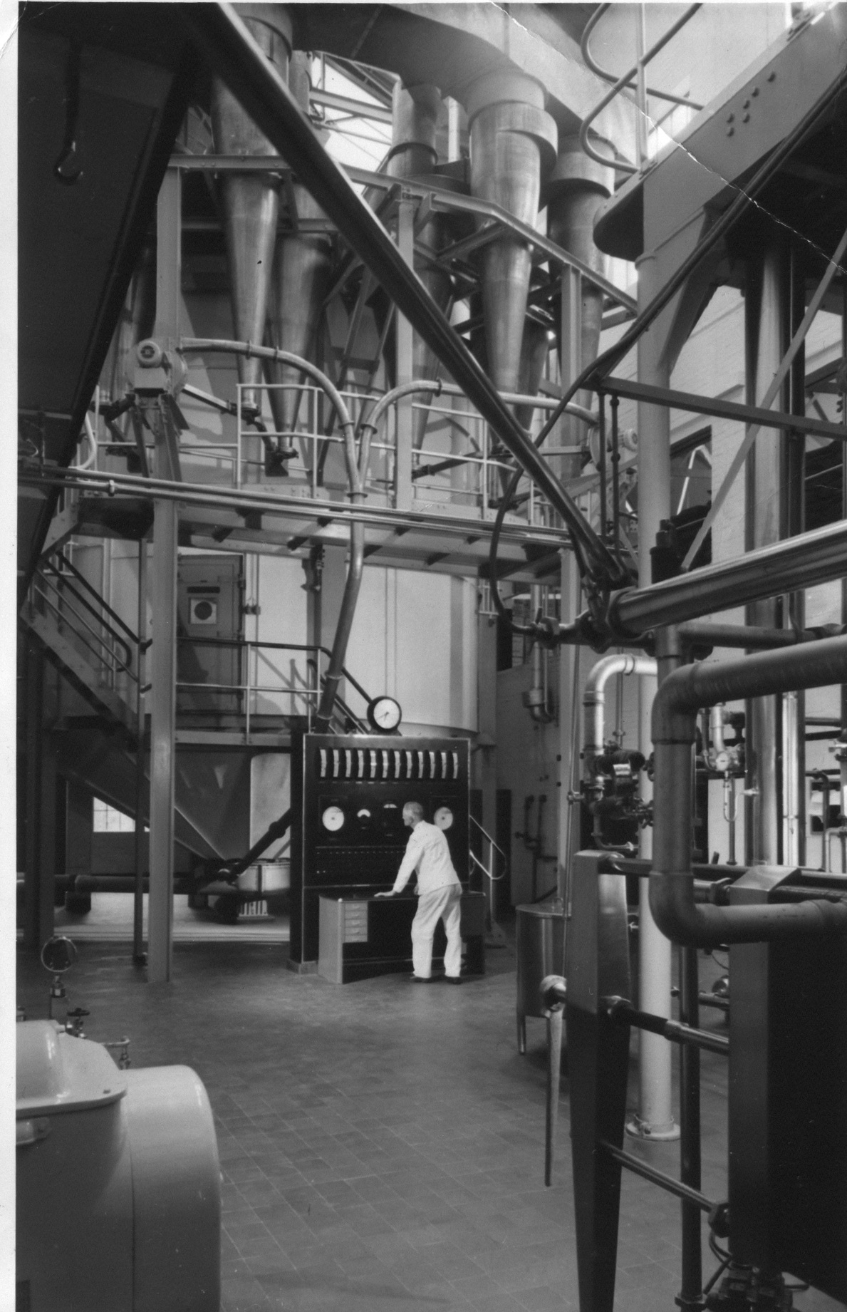 Mr. W. Miller at the controls of the milk powder plant. - Blackdown ...
